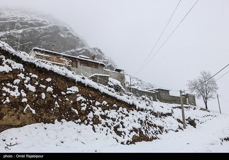 Snow Blankets Northern Iranian Tourist Village - Iran Front Page